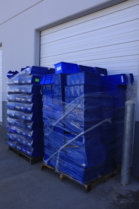 (2) Pallets Of Blue Bins for sale