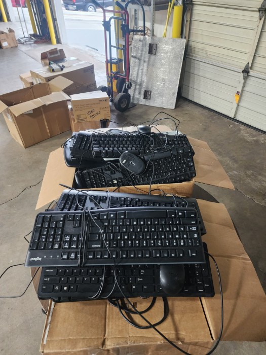 Assorted boxes of keyboards for sale