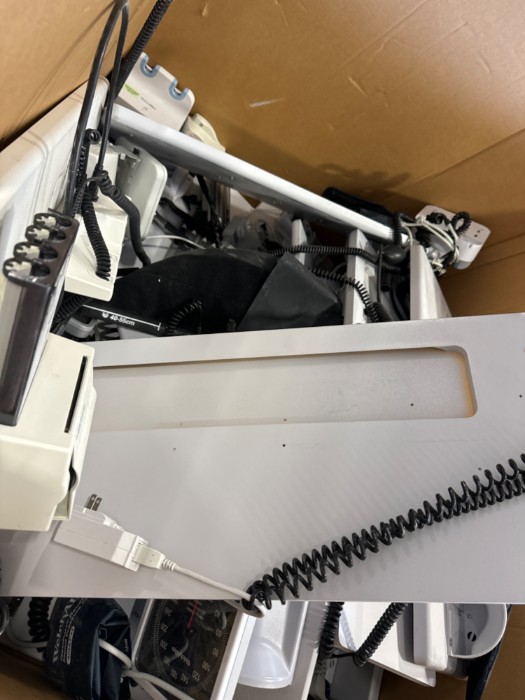 Box filled with Welch Allyn Wall units for sale